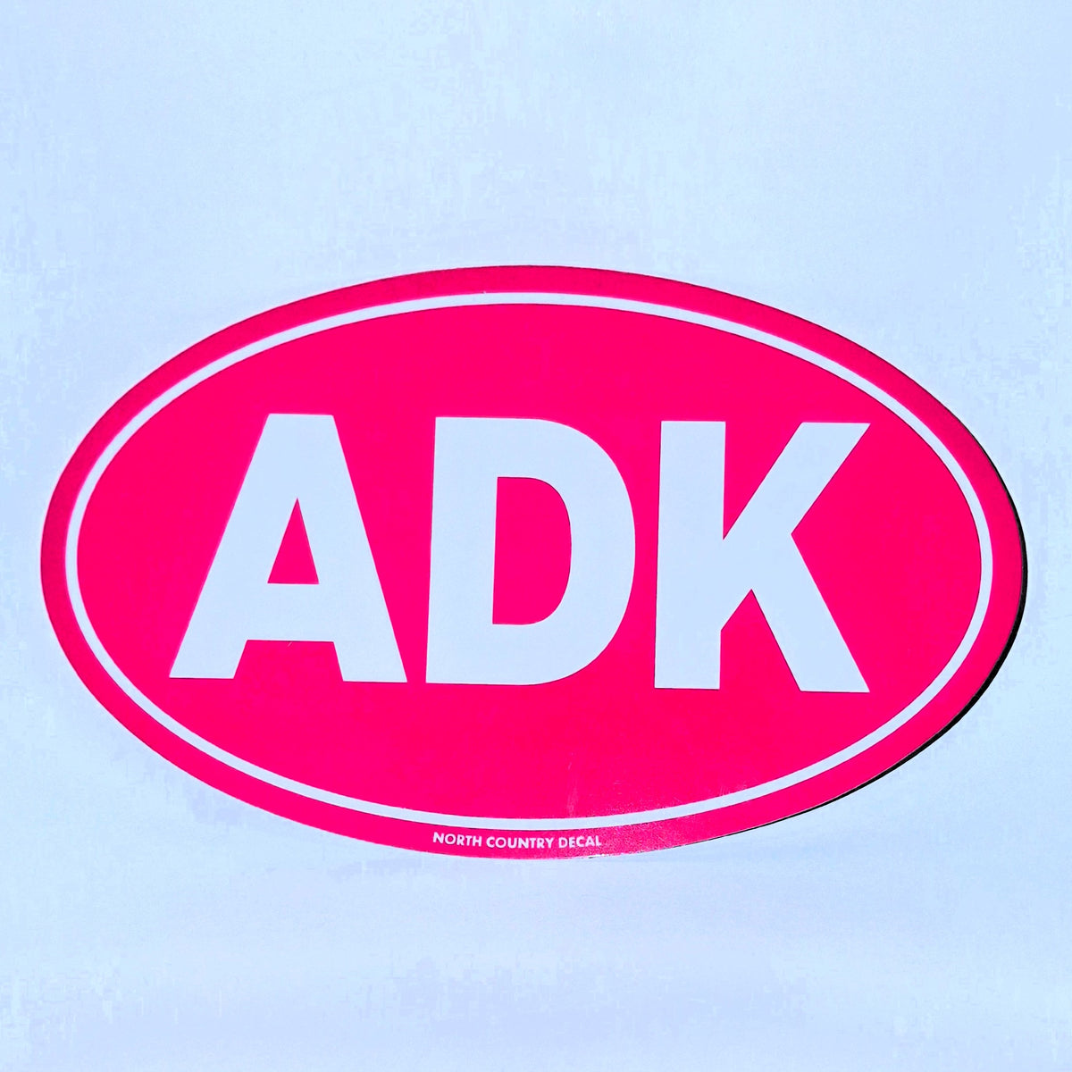 ADK Oval Bumper Sticker (black, white, green) – The Village Merc.