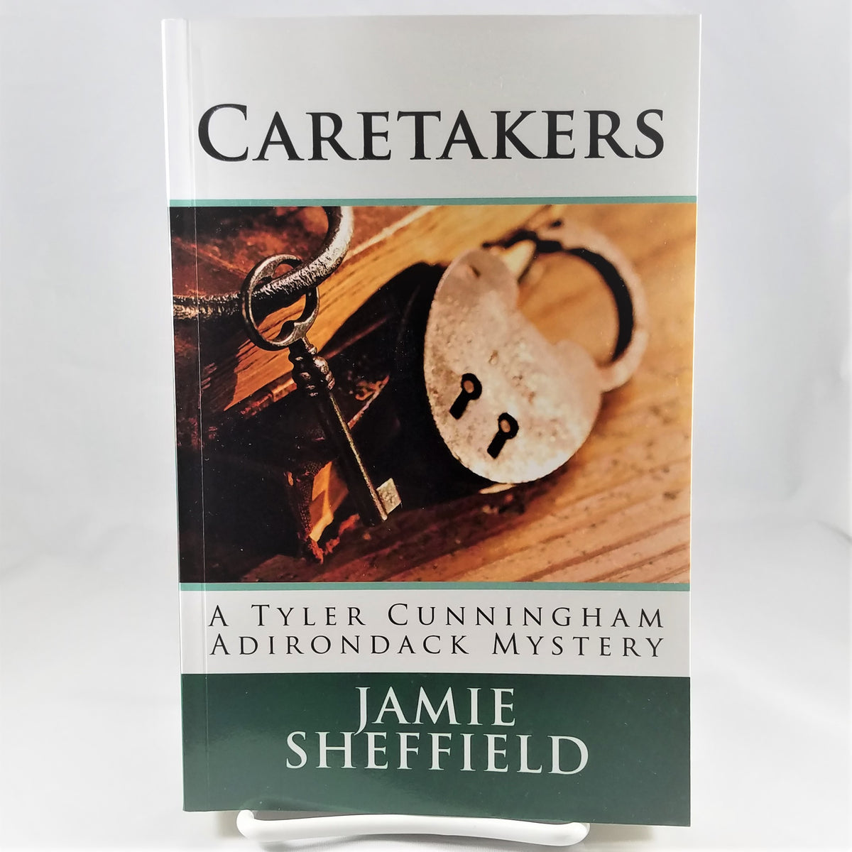 Caretakers by Jamie Sheffield – The Village Merc.